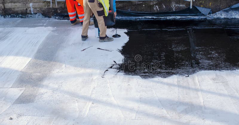 Waterproofing Coating. Builder Applying Waterproofing Bitumen Mastic on ...