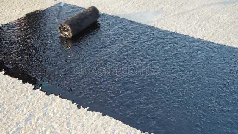 Worker Applies Bitumen Mastic on the Foundation Stock Footage - Video ...