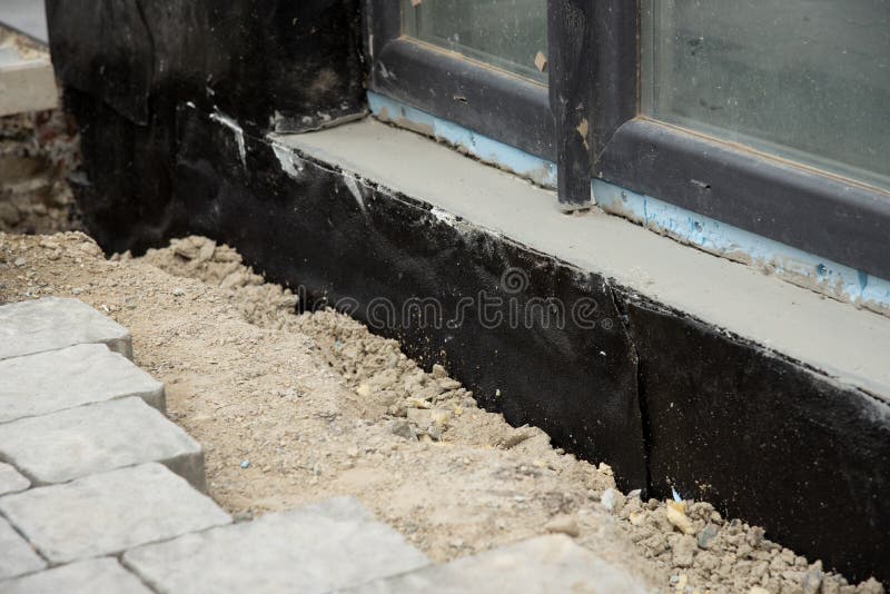 Waterproofing House Foundation with Spray on Tar and Roll Waterproofing ...