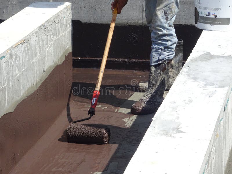 Waterproofing Layer Applied by Construction Workers on Top of Concrete ...
