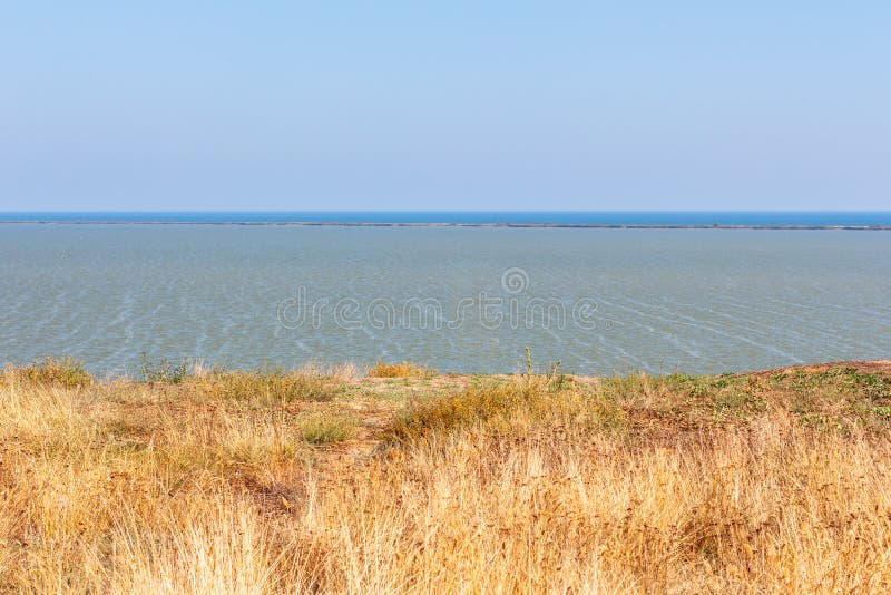 Waters Below Surrounded by Greenery and a Clear Sky Stock Photo - Image ...