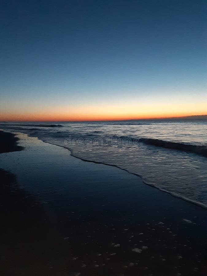 Waters Edge Sunset Ledge stock photo. Image of edge - 241831260