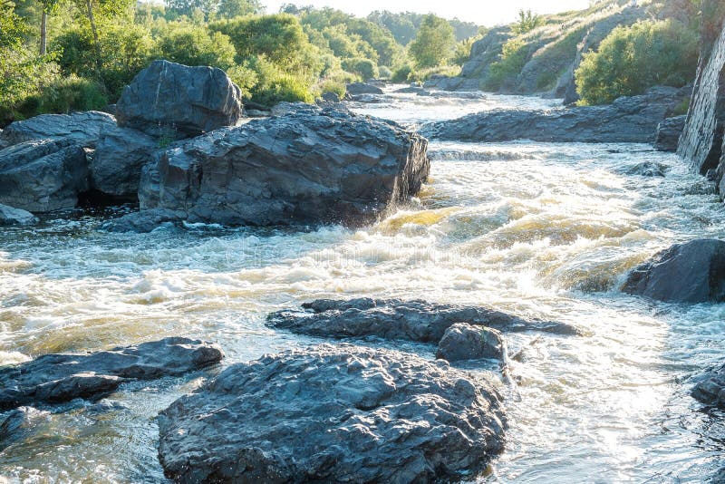 The Waters of a Mountain River in a Rapid Stream Run among the Stones ...