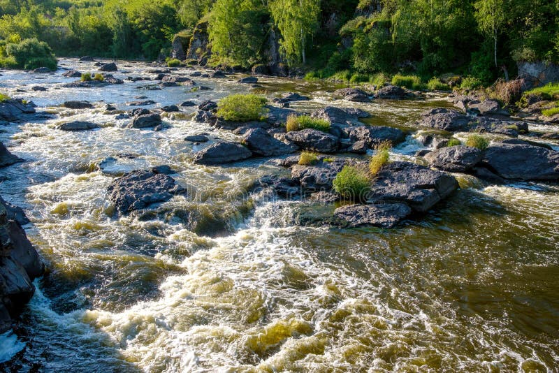 The Waters of a Swift Mountain River Running between Stones Stock Photo ...
