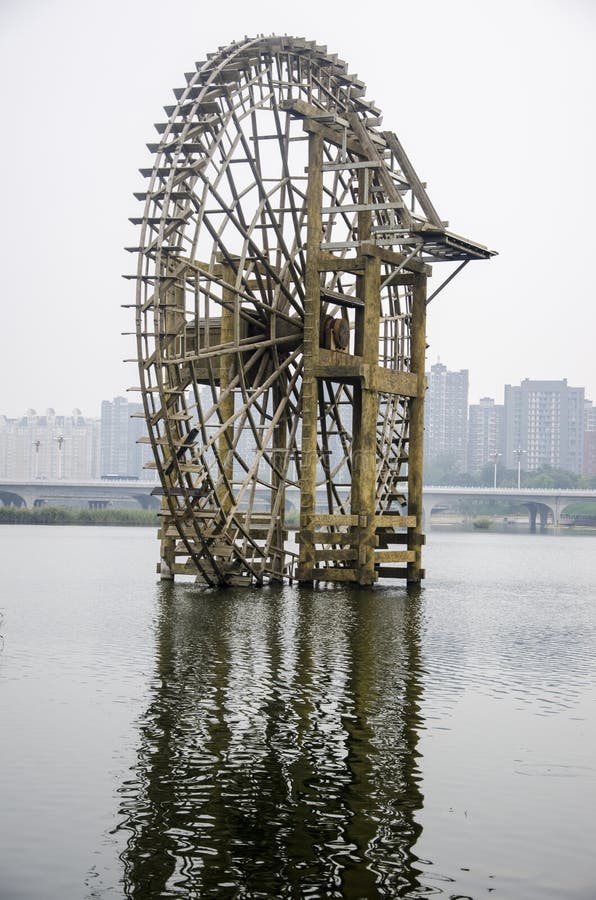 Waterwheel stock image. Image of tree, water, road, stone - 78444065