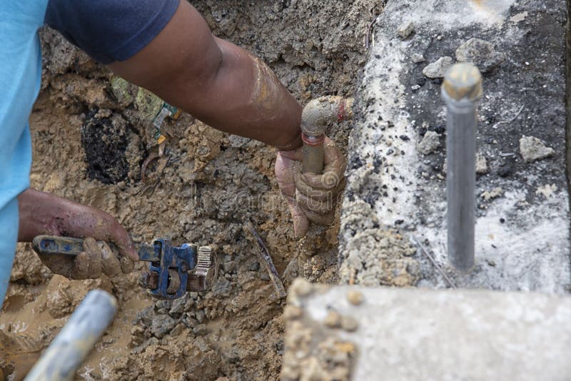 Waterworks Worker Repairing the Water Ferrule Valve Pipe from Leakage ...