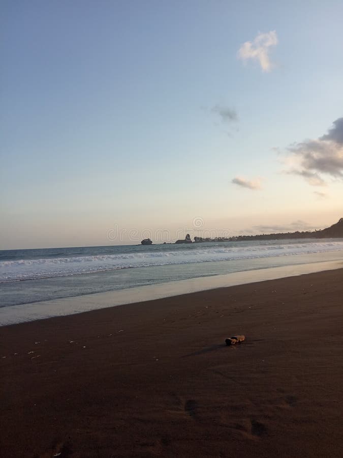 Watu Ulo Beach stock photo. Image of east, java, beach - 227821624