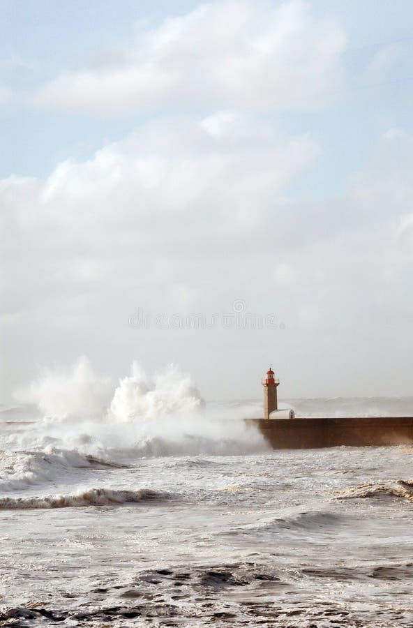 A Wave Against a Lighthouse Stock Image - Image of sand, tower: 254463173