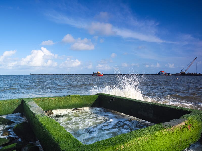 Wave Barrier, the Blue Sky and White Clouds on the Weekend Stock Photo ...