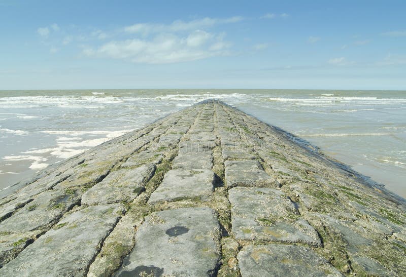 Wave-breaker stock image. Image of stone, beach, blue, water - 883179