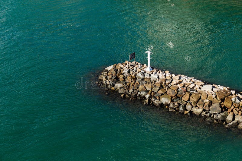 Wave breaker stone stock photo. Image of water, light - 32846330