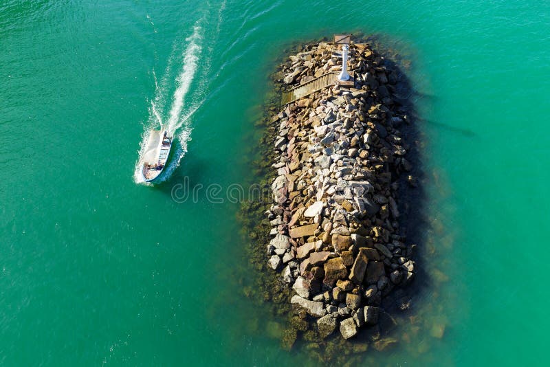 Wave Breaker Stone with Ship Stock Image - Image of ship, groyne: 34005353
