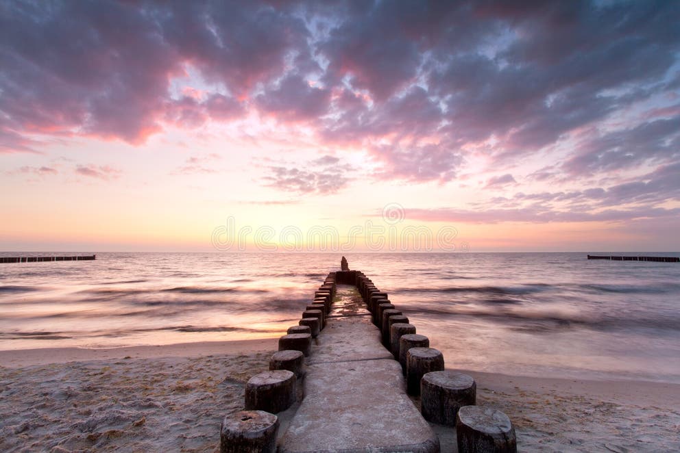 Wave breakers at the beach stock image. Image of jetty - 42380489