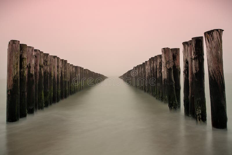 Wave breakers in the ocean stock image. Image of dusk - 212432097