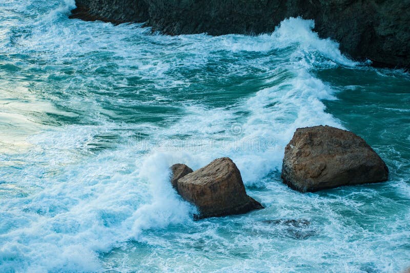 A Wave Breaking Across a Rocky Shore Stock Image - Image of natural ...