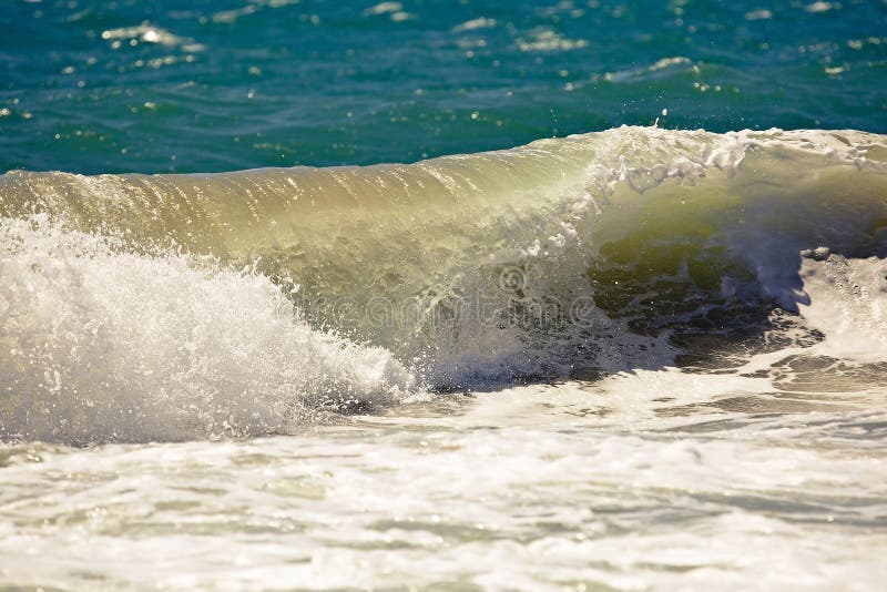 Wave breaking near beach stock photo. Image of travel - 180672254