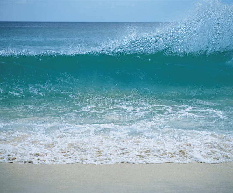 Wave breaking on shore stock image. Image of ocean, world - 30844779