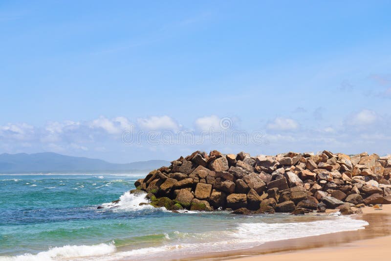 Wave Breakwall at the Beach Stock Image - Image of ocean, sand: 250817709
