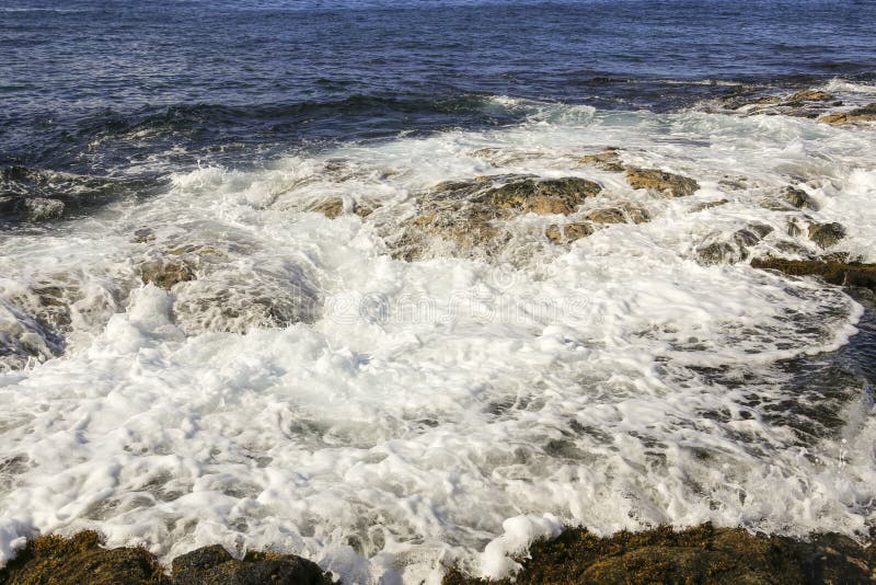 Ocean Wave Breaking Over Rocks Stock Image - Image of creating, surface ...