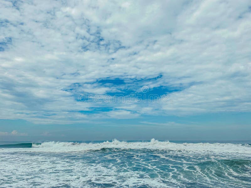 Wave of Cangkring Beach stock photo. Image of cloud - 376009562