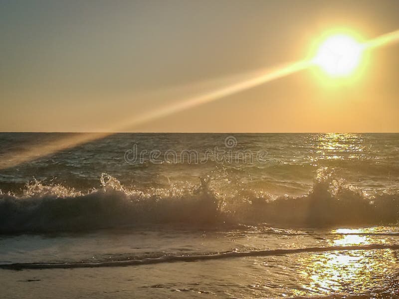 Wave with Cloud of Splash on Beach, Sochi at Sunset Stock Photo - Image ...
