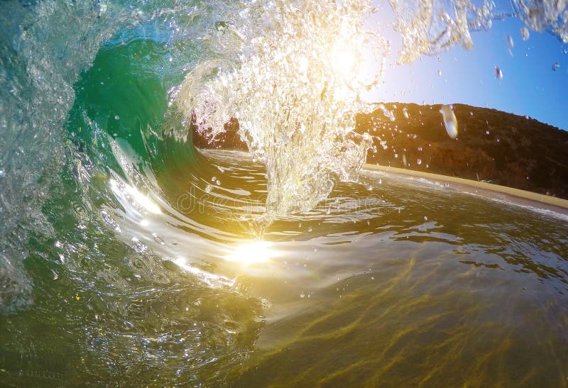 The Wave Covers the Sunlight. Inside View. Stock Photo - Image of spray ...