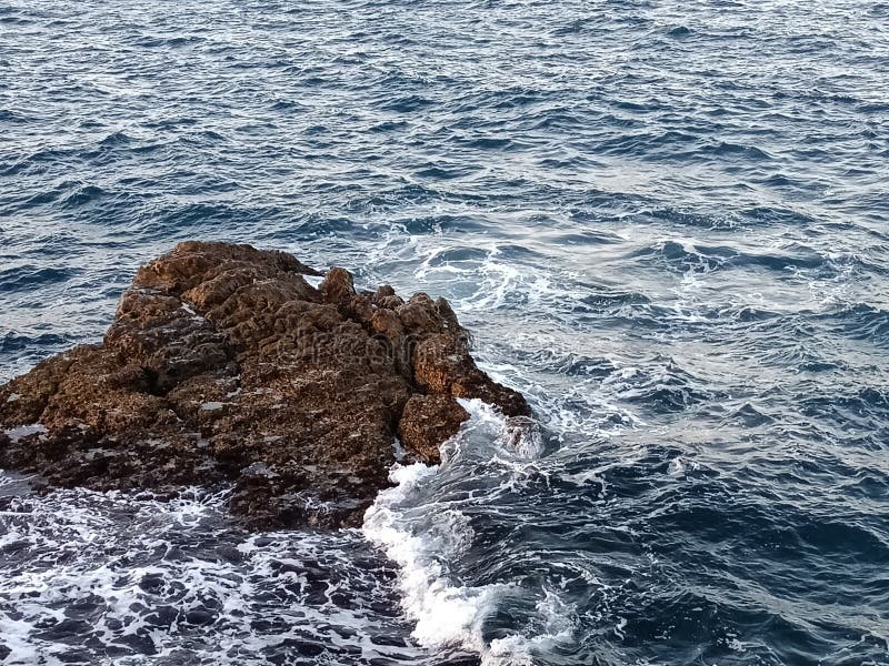 Wave crash the rock stock photo. Image of nature, water - 272379456