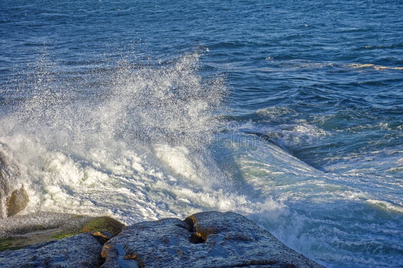 Wave crashing on the rock stock image. Image of seawater - 92663141