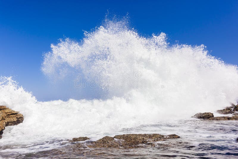 Wave Crashing Rocky Coastline Stock Photo - Image of spray, white: 60864904
