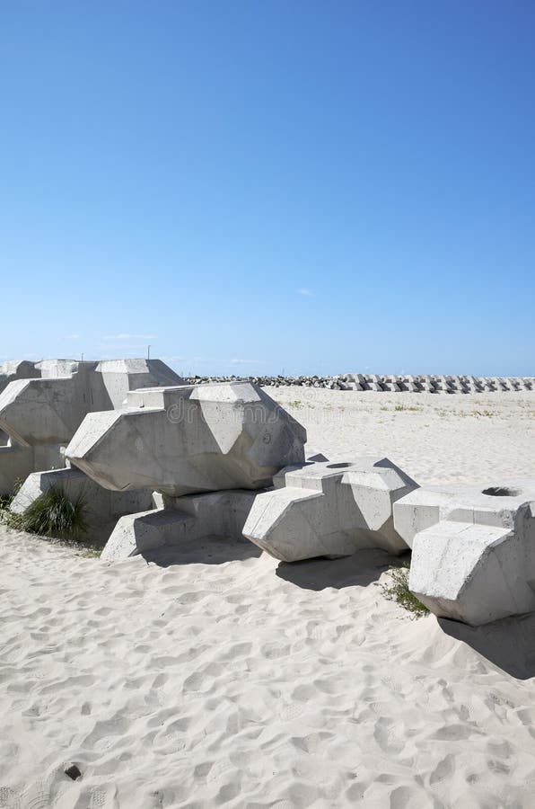 Wave Dissipating Concrete Blocks on a Beach Stock Photo - Image of ...