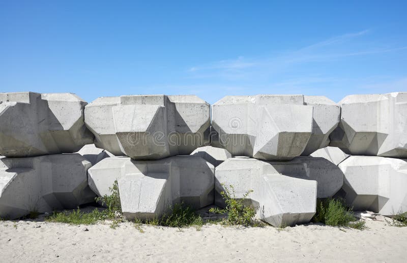 Wave Dissipating Concrete Blocks on a Beach Stock Photo - Image of ...