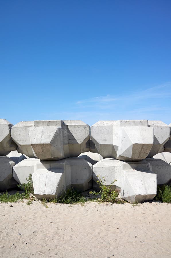Wave Dissipating Concrete Blocks on a Beach Stock Photo - Image of ...