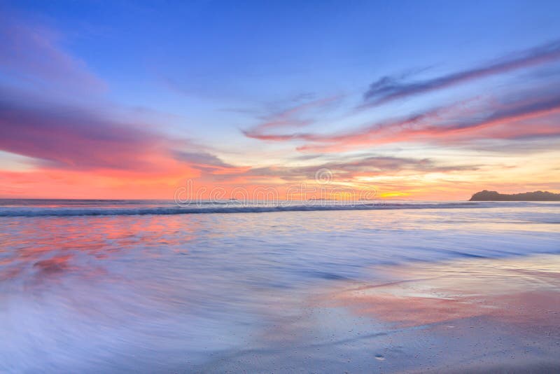 Wave Foam Moving on the Beach Stock Photo - Image of ocean, pink: 41643650