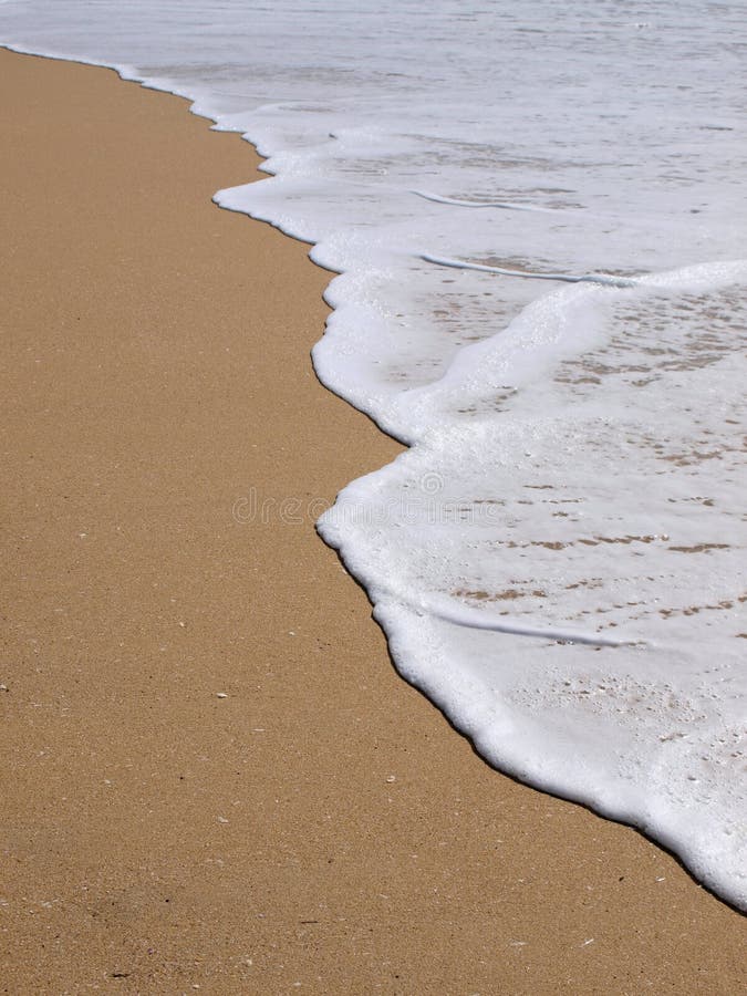A wave in the foreshore stock image. Image of spain, lanzada - 58967657