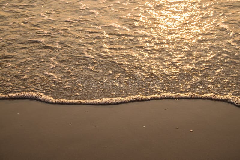 Wave on Golden Sand in Morning Stock Photo - Image of furrow, morning ...