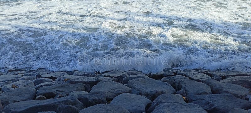 Wave Heat the Stone at the Beach when Sunset Time Stock Photo - Image ...