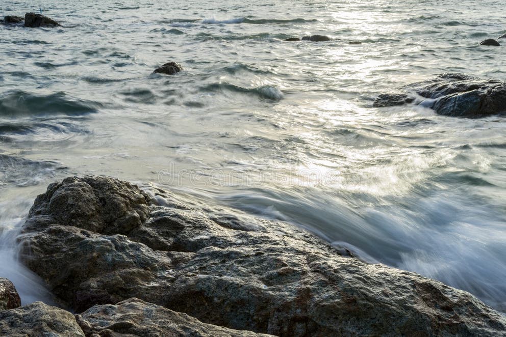 Wave hit rock stock image. Image of storm, dawn, shore - 56536671