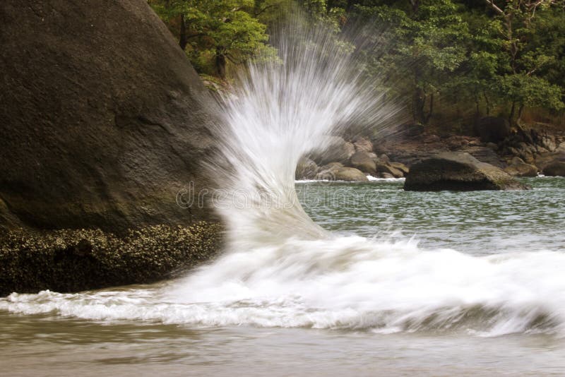 Wave hitting rock stock image. Image of arabian, nature - 62660631