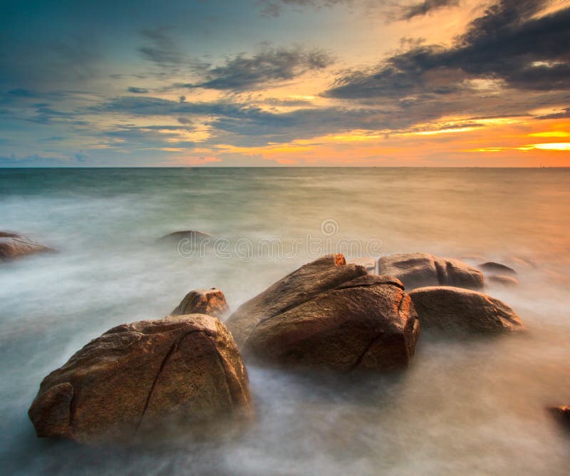 Wave Impact Rocks on the Beach Stock Image - Image of color, dusk: 36623085
