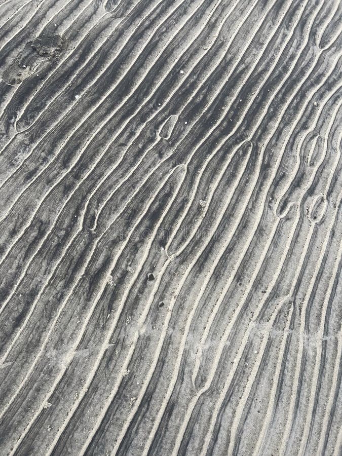 Wave patterns in sand stock image. Image of tide, tones - 270796289