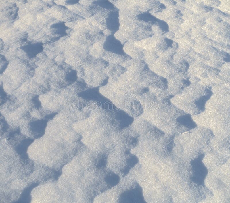 Wave Patterns in the Snow stock photo. Image of surface - 107619998