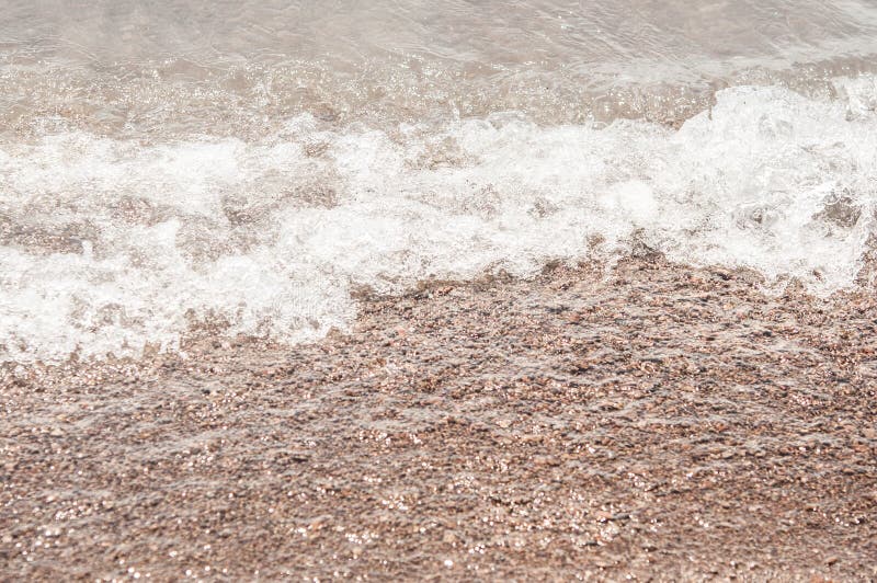 Sea wave and pebble beach stock image. Image of blue - 98830933