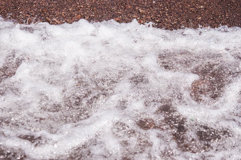 Sea wave and pebble beach stock photo. Image of landscape - 98831160