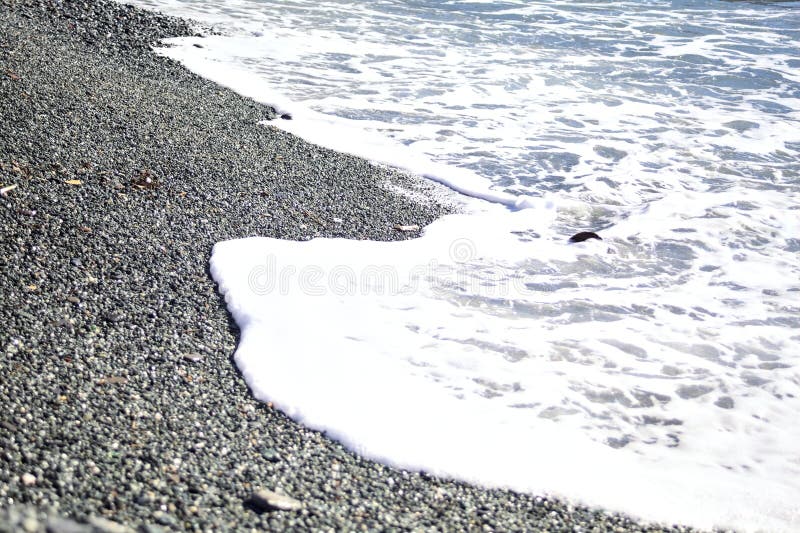 Wave on a Pebbled Beach Seen Up Close Stock Image - Image of pebble ...