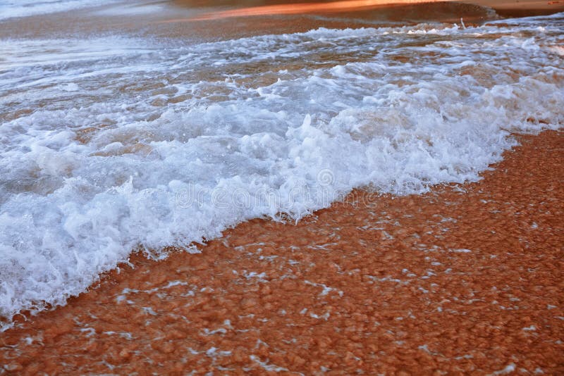 Wave on Sandy Beach. Background. Splash of Waves on the Sandy Beach ...