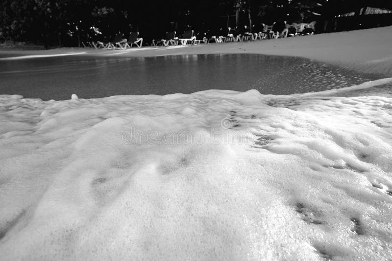 Wave on Sandy Beach. Background. Splash of Waves on the Sandy Beach ...