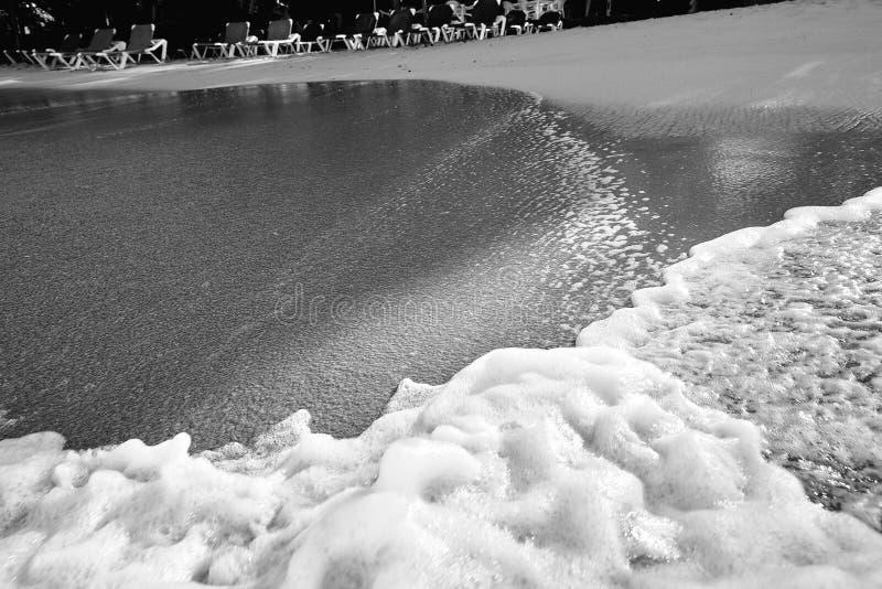 Wave on Sandy Beach. Background. Splash of Waves on the Sandy Beach ...