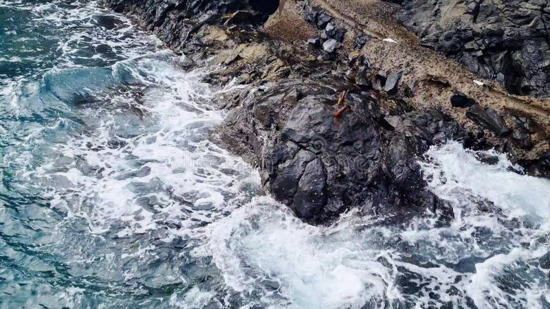 The Wave of the Sea Rolls on the Shore. Rock Washing. Stock Video ...