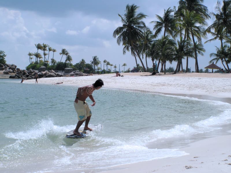 Wave skim surfing stock photo. Image of asia, asian, vacation - 1003322