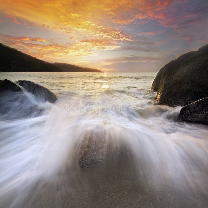 Wave splash stock image. Image of liquid, rock, flow - 36791737